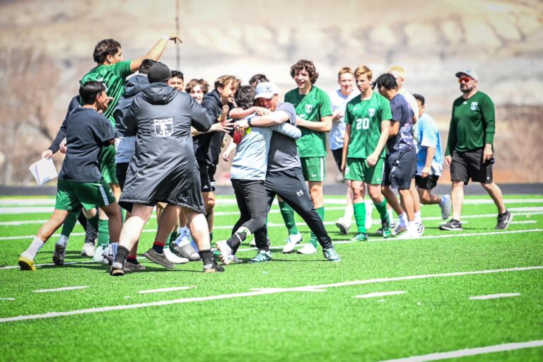josh webb celebrating with team after upset win over Cody - SweetwaterNOW